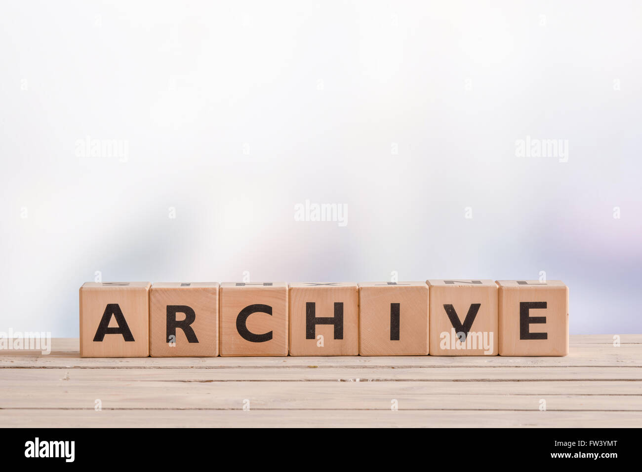 Archive sign made of blocks on a wooden desk Stock Photo - Alamy