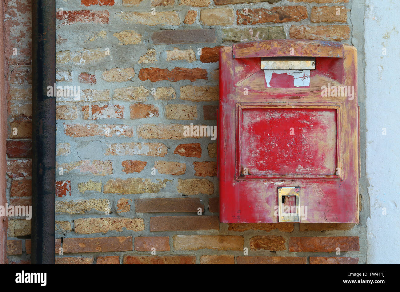 big red mailbox to deliver mail across the world Stock Photo - Alamy