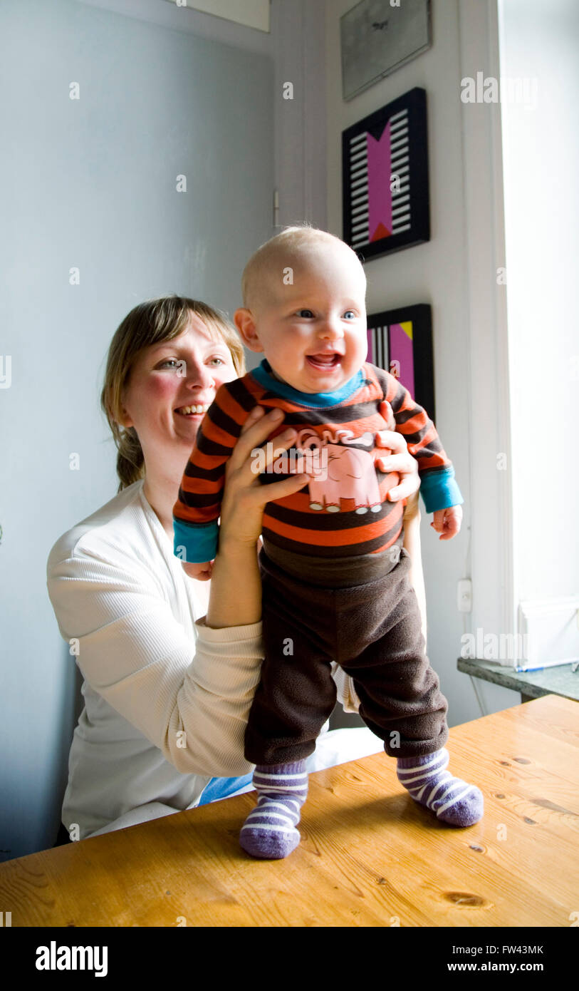 Baby trying to stand hi-res stock photography and images - Alamy