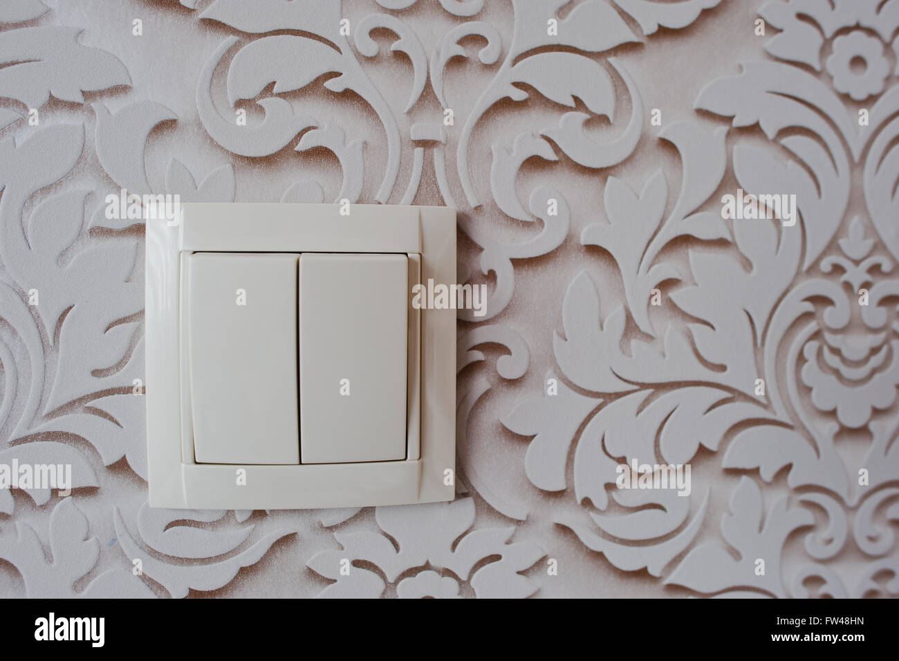 Electric light switch at vintage decor wall Stock Photo - Alamy