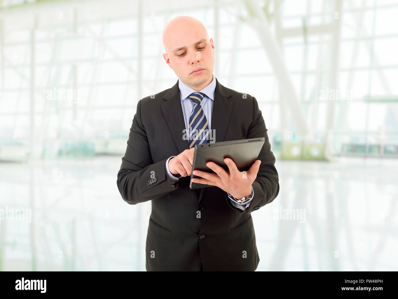 businessman using touch pad of tablet pc, at the office Stock Photo - Alamy