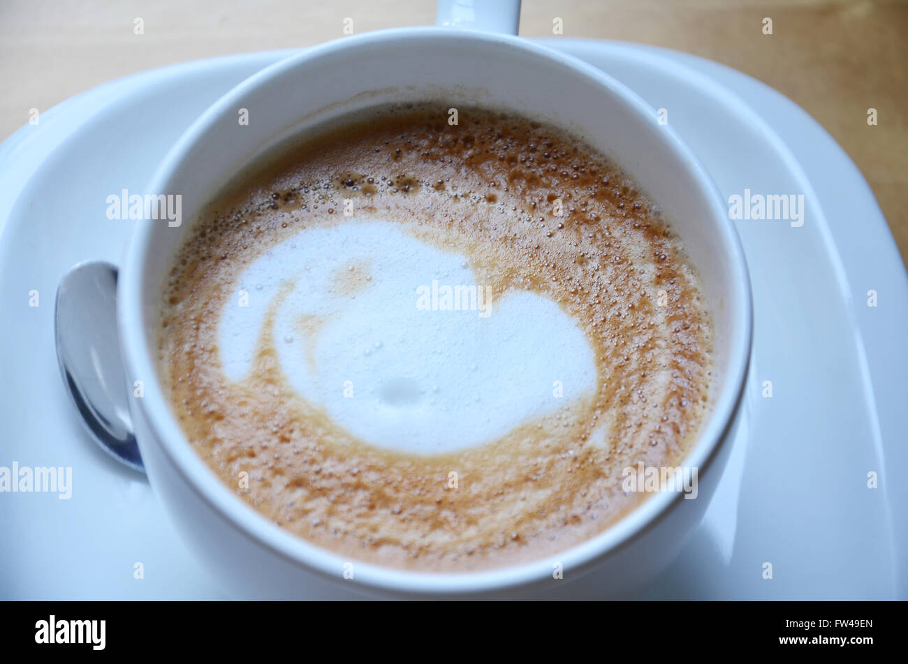 Latte Hot Coffee in coffee shop Stock Photo - Alamy