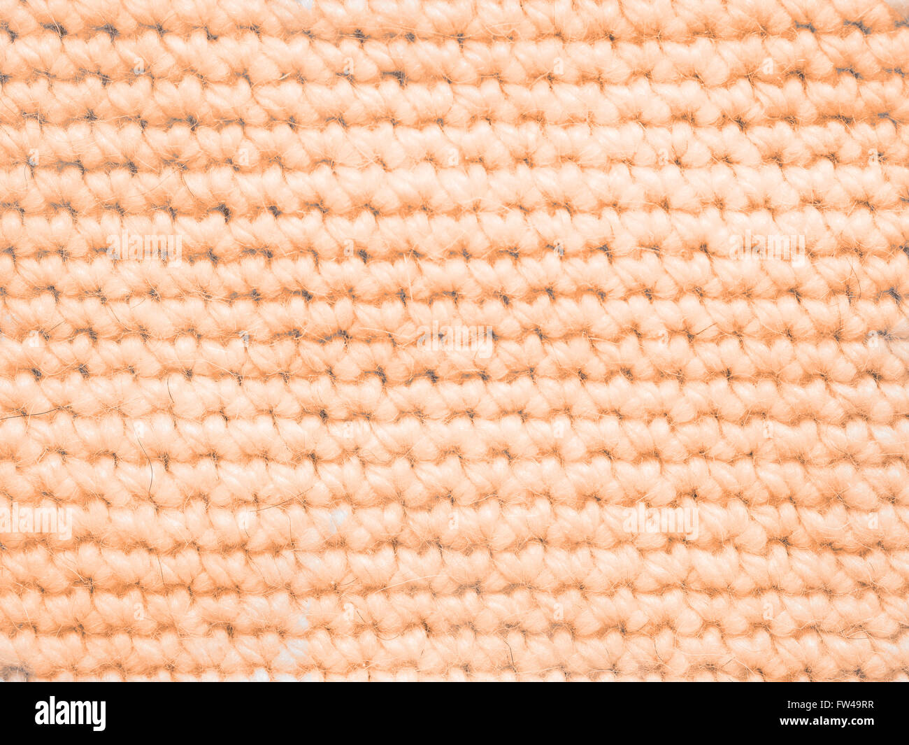 light orange Coloured knitted Jersey as textile background Stock Photo ...