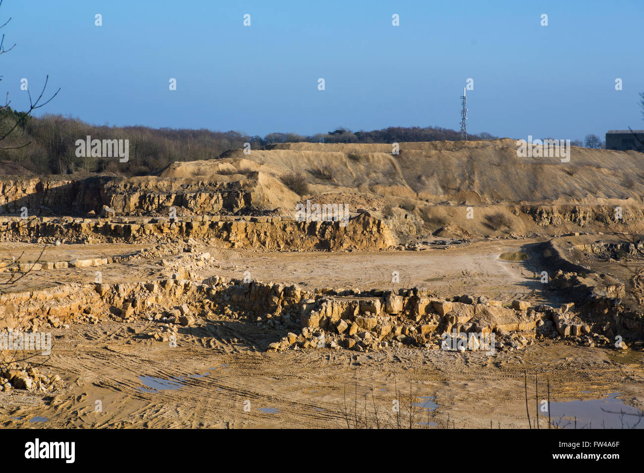 Looking out over a large old stone quarry Stock Photo - Alamy