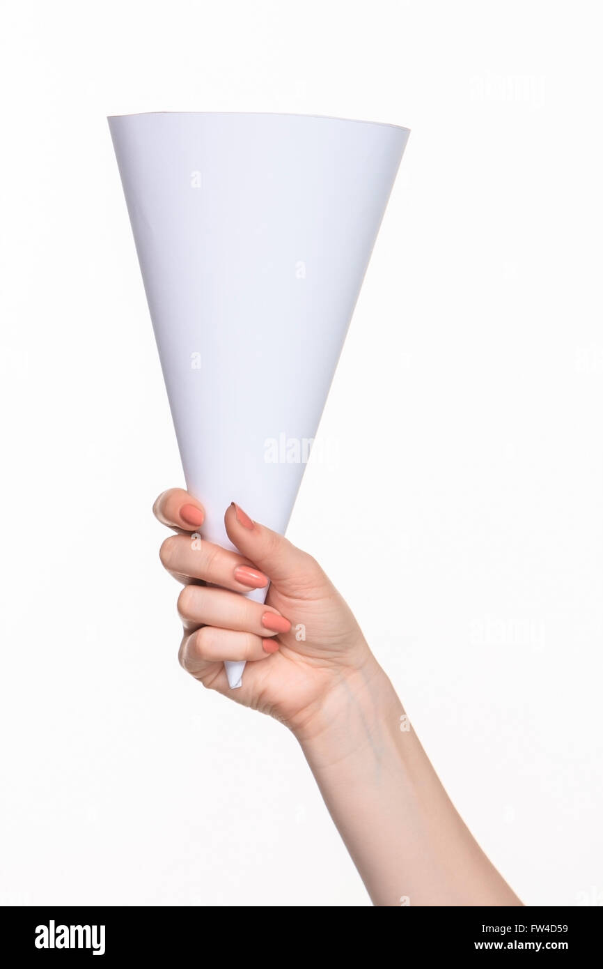 The cone in female hands on white background Stock Photo - Alamy