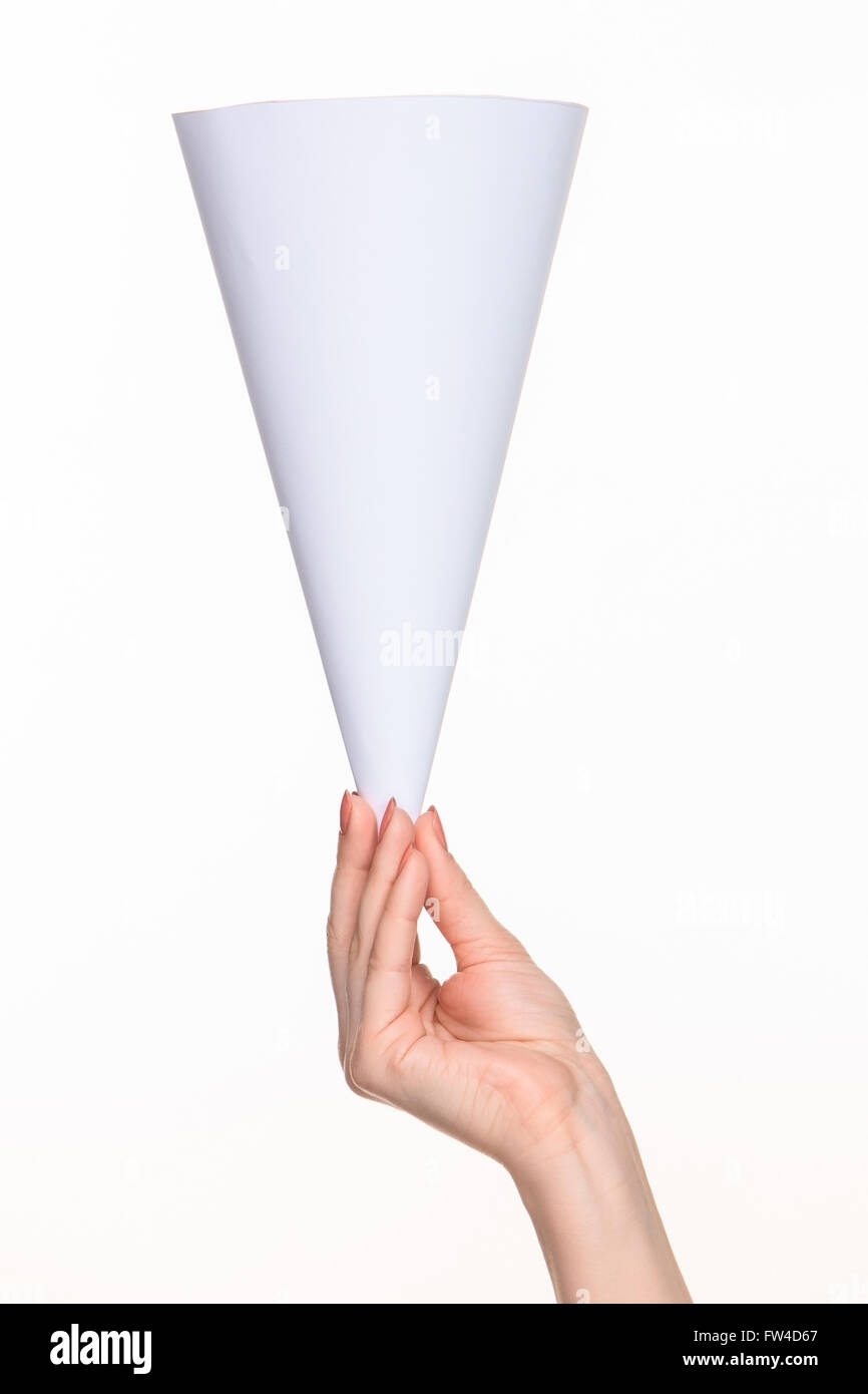 The cone in female hands on white background Stock Photo - Alamy