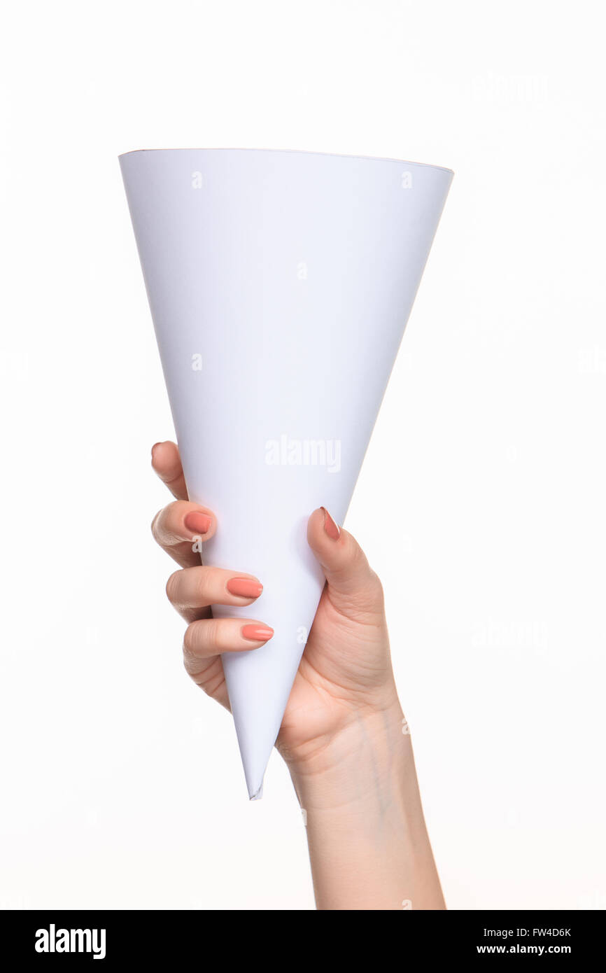 The cone in female hands on white background Stock Photo - Alamy