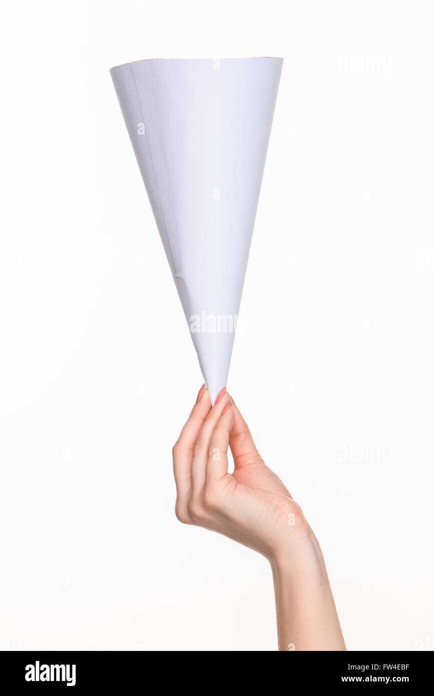 The cone in female hands on white background Stock Photo - Alamy