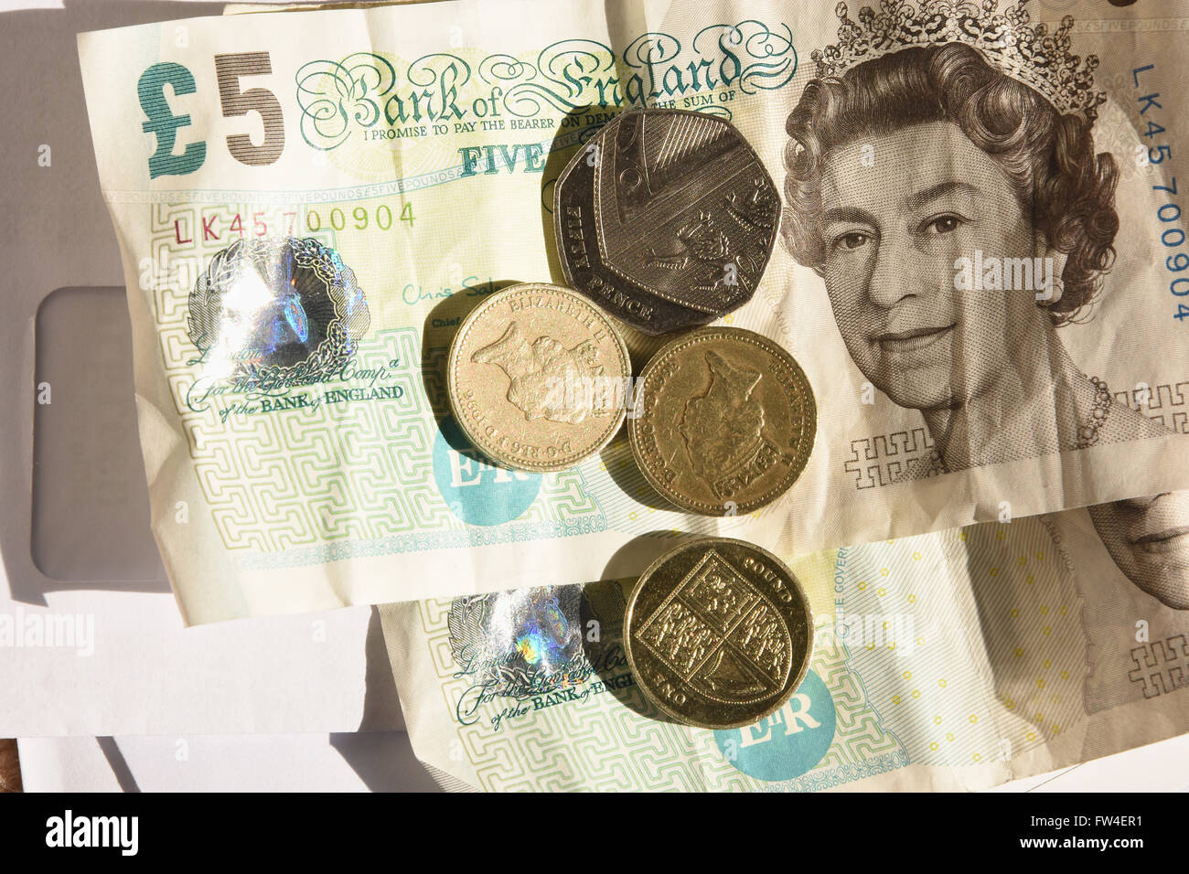 Various currency notes and coins hi-res stock photography and images ...