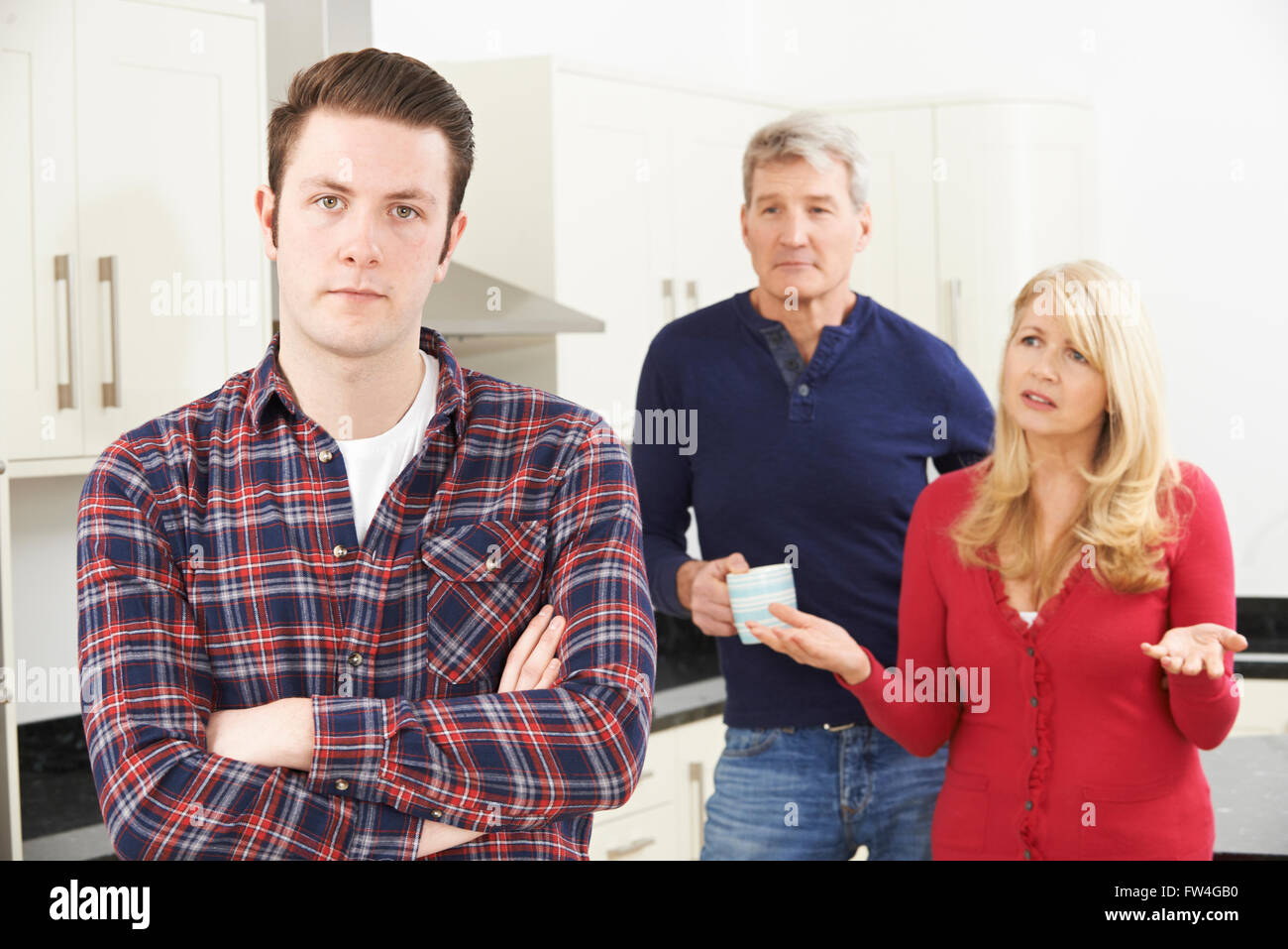 Mature Parents Frustrated With Adult Son Living At Home Stock Photo - Alamy