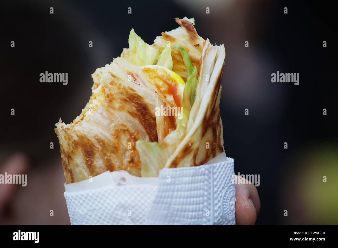 Picture of some Chinese street food consisting of a fried bread casing ...