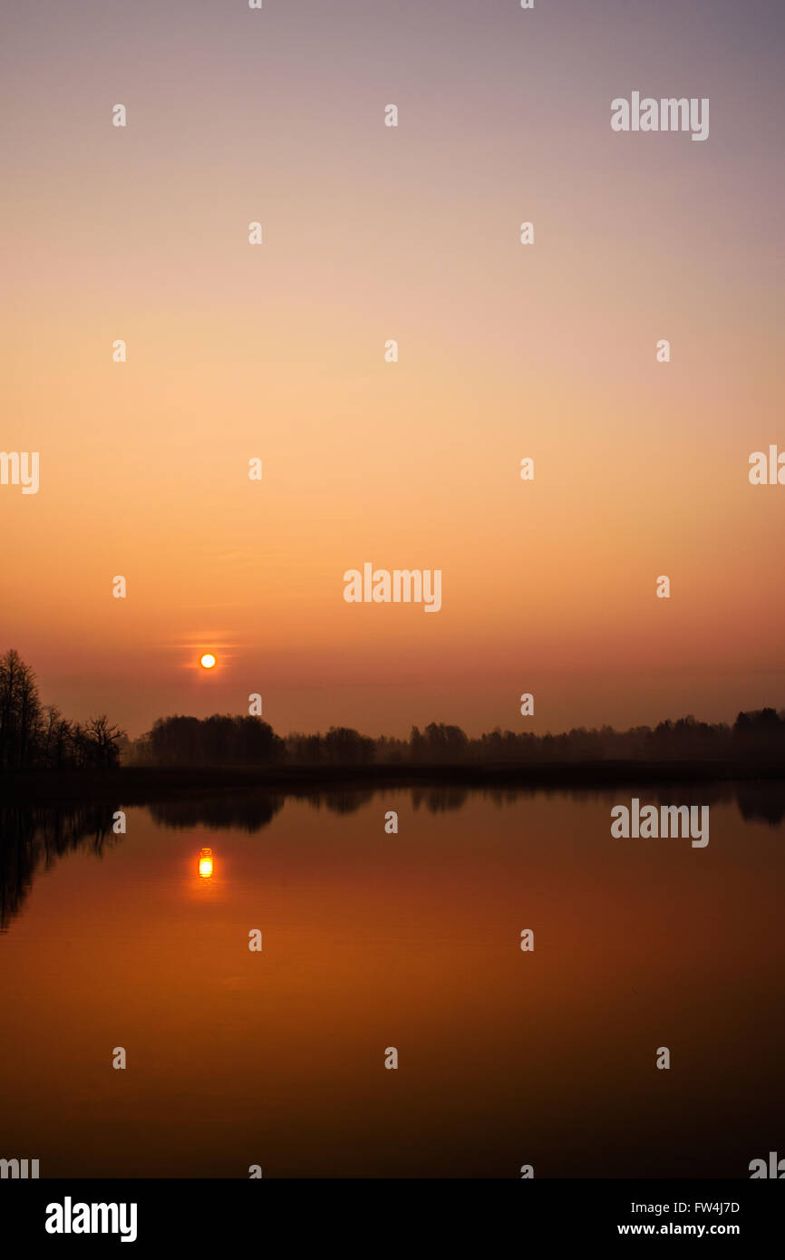 Sunrise over the water hi-res stock photography and images - Alamy