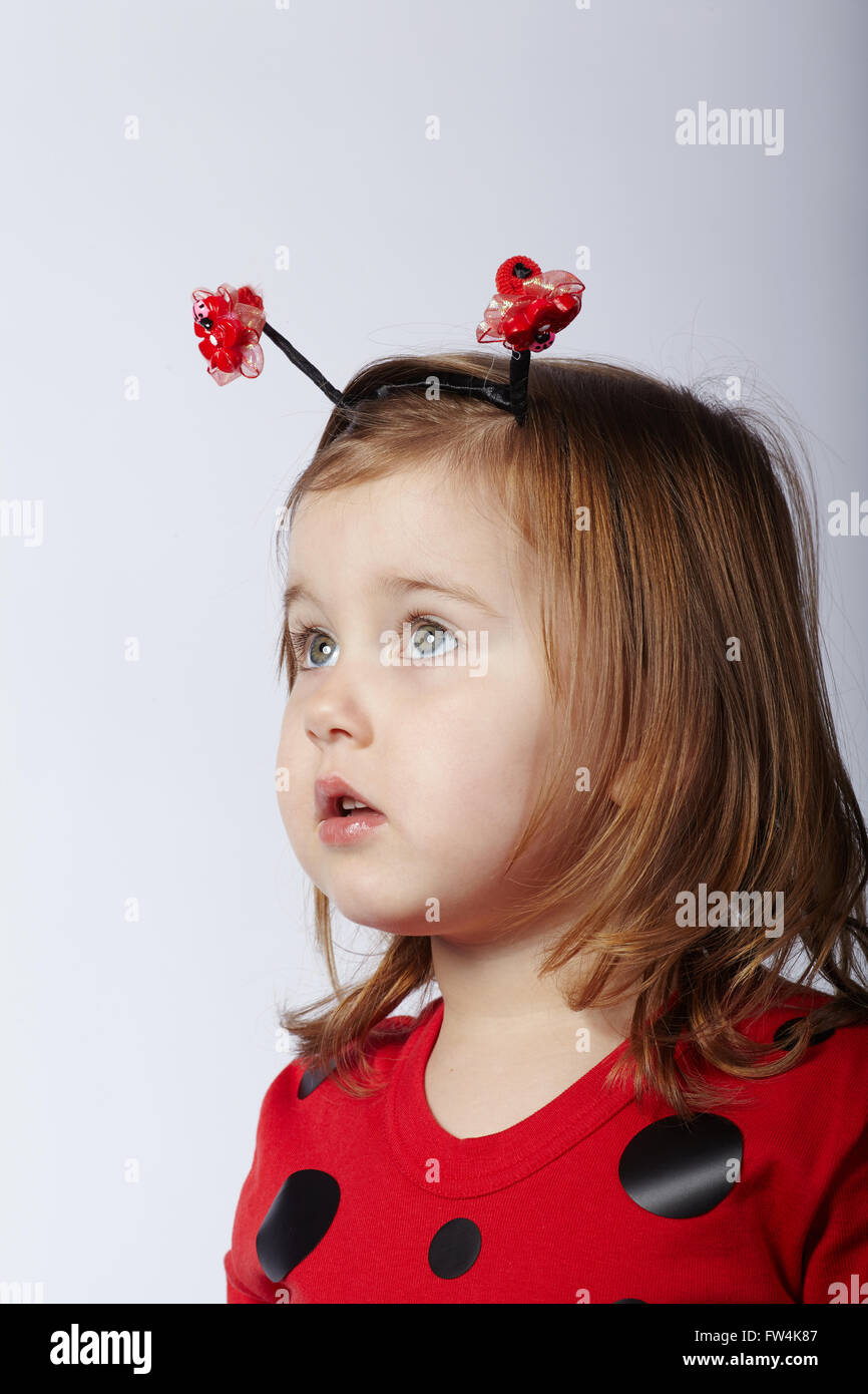 little funny girl in ladybug costume Stock Photo - Alamy