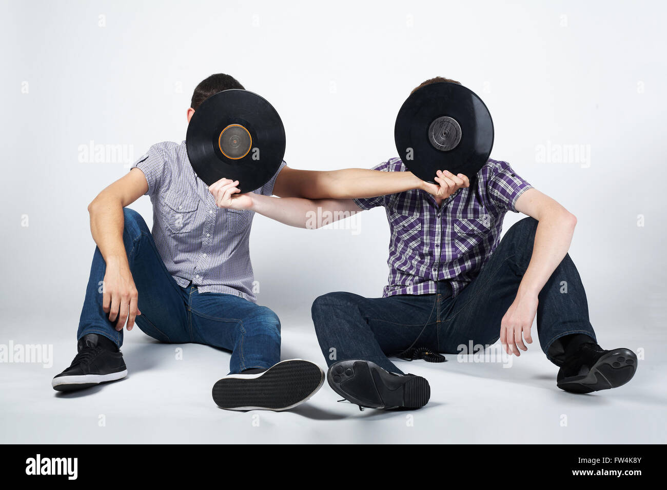 two crazy guys with plates Stock Photo - Alamy