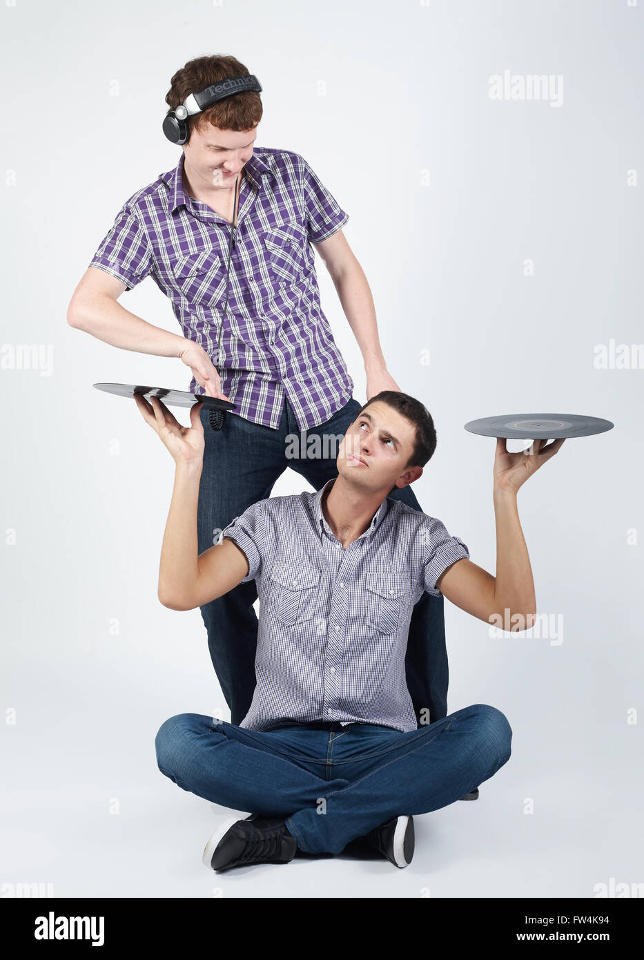two crazy guys with plates Stock Photo - Alamy