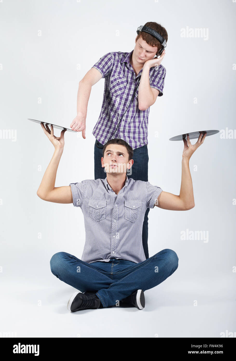 two crazy guys with plates Stock Photo - Alamy