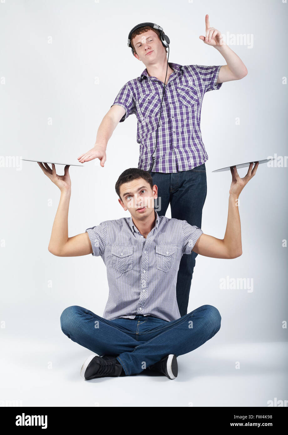 two crazy guys with plates Stock Photo - Alamy
