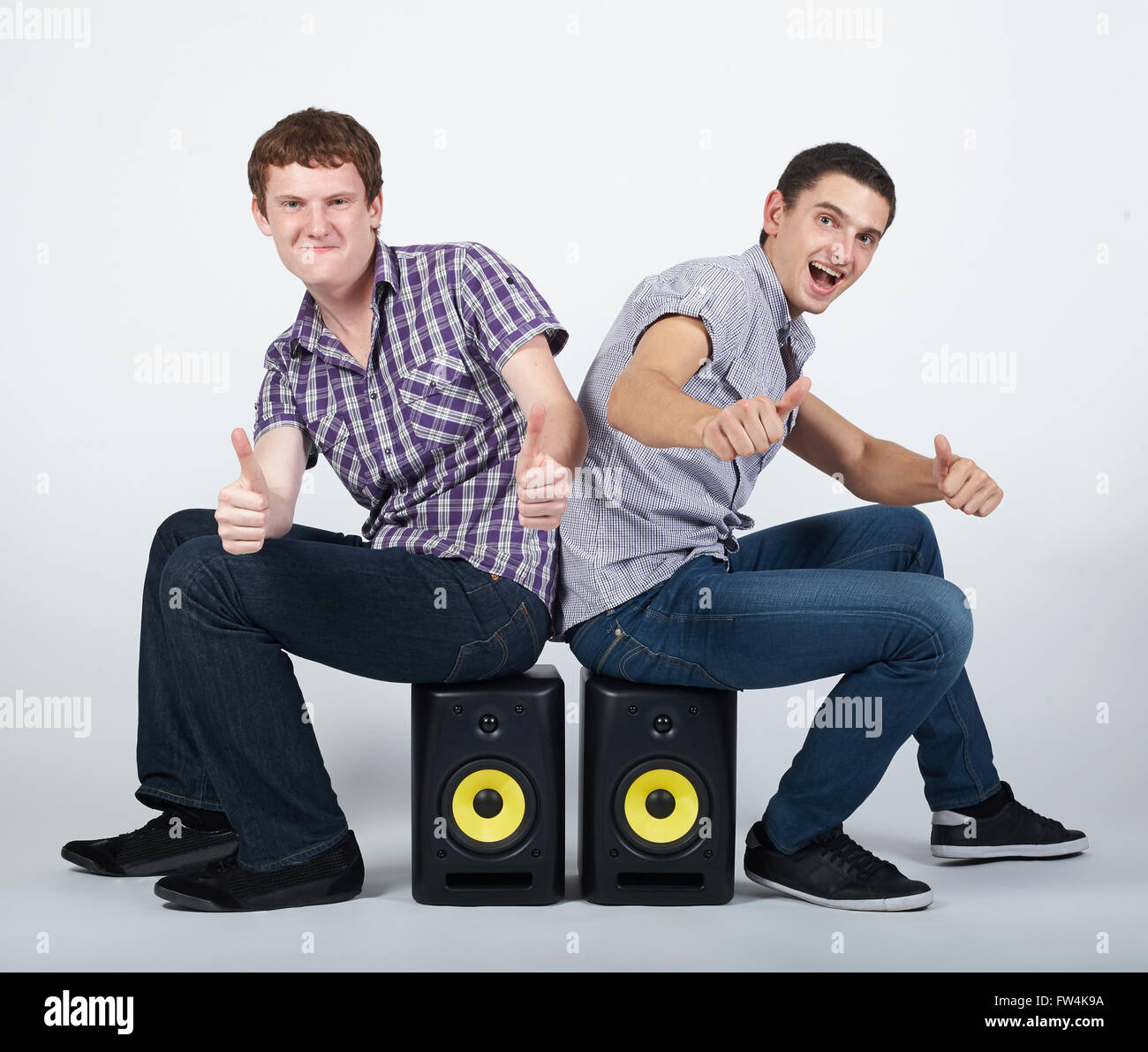 two funny boys with speakers Stock Photo - Alamy