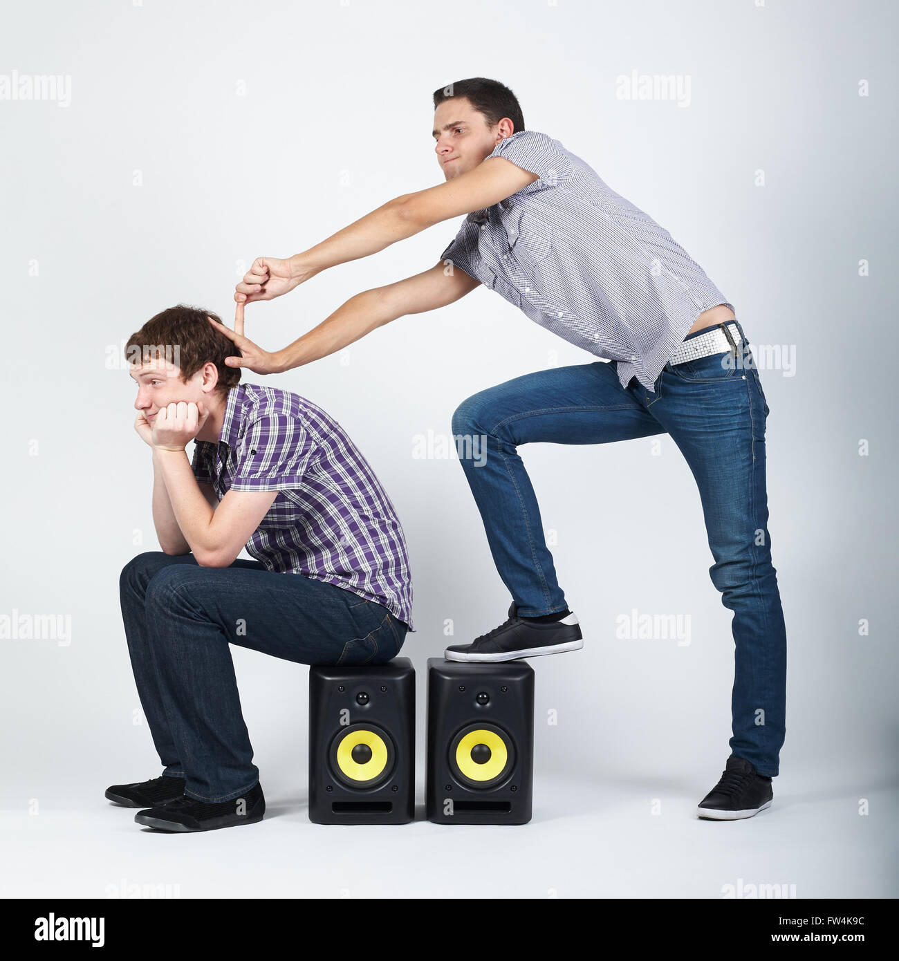 two funny boys with speakers Stock Photo - Alamy