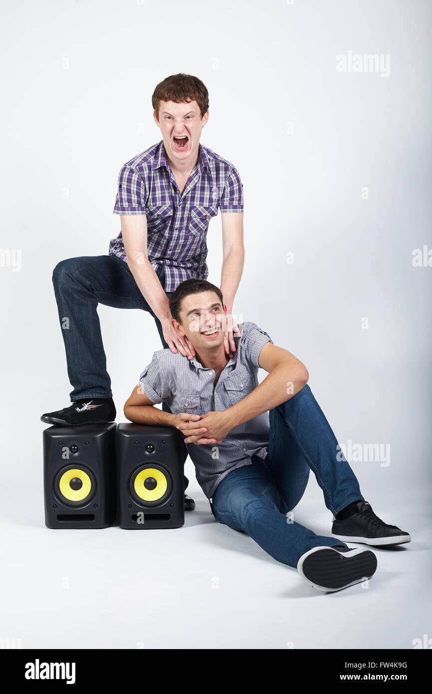 Two funny boys speakers hi-res stock photography and images - Alamy