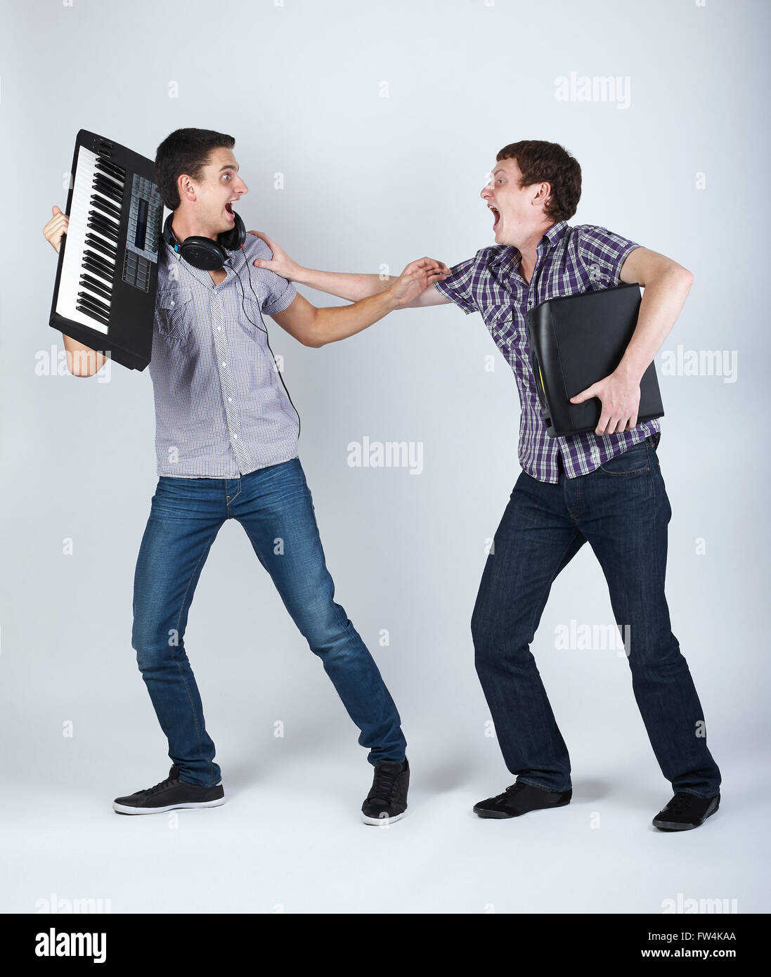 two funny boys with speakers Stock Photo - Alamy