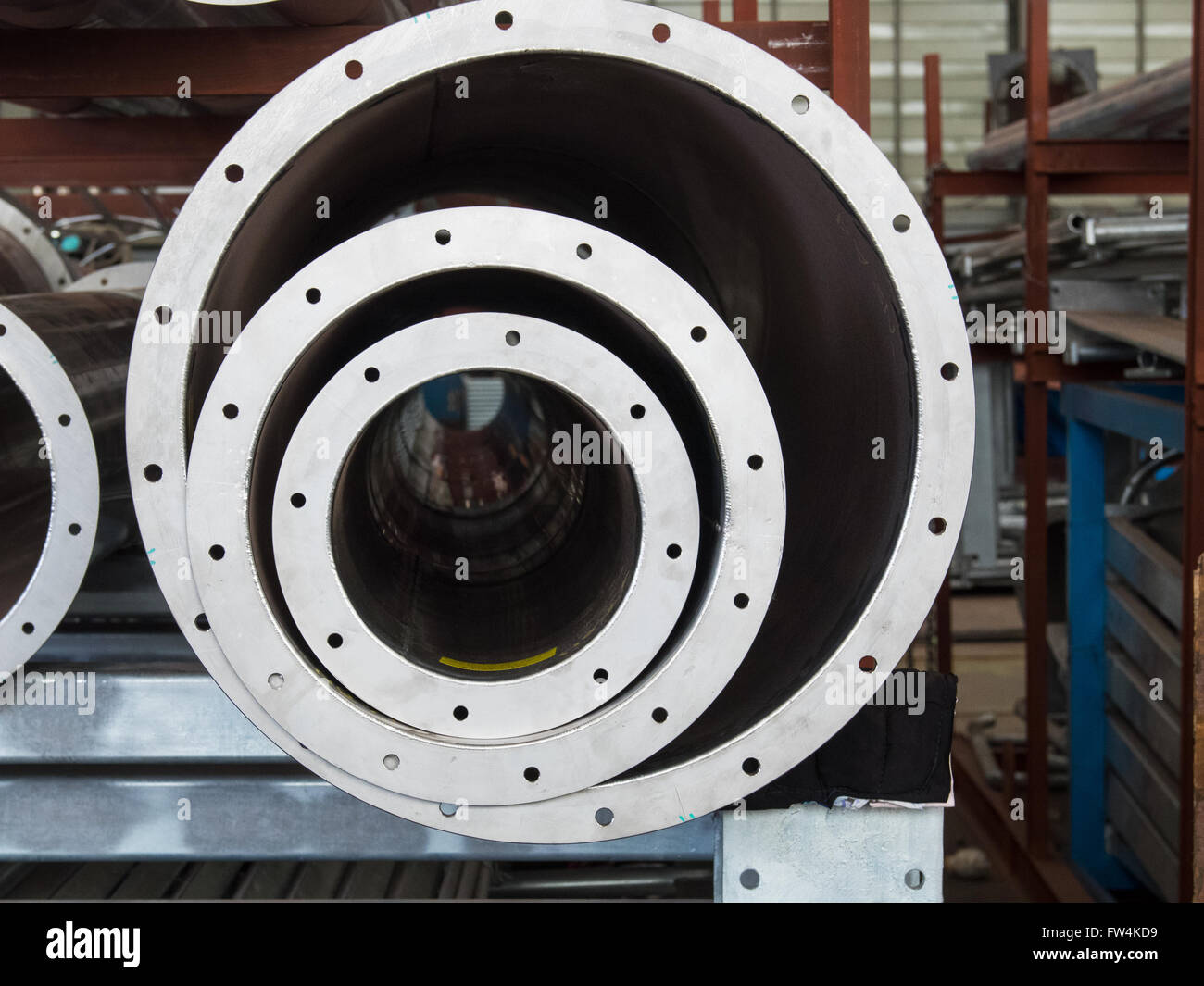 Large diameter steel pipes on a storage shelf Stock Photo - Alamy