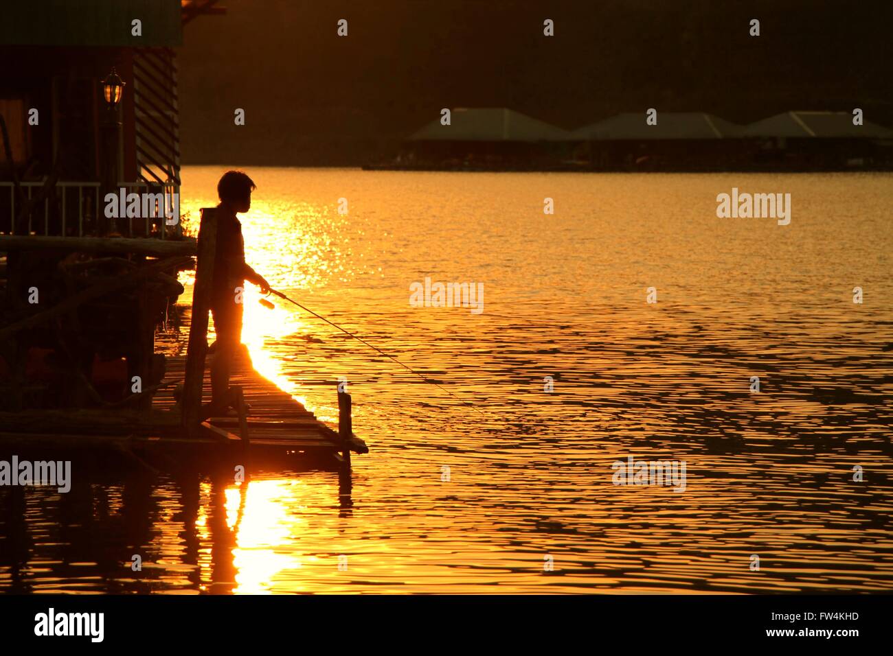 Man floating water silhouette hi-res stock photography and images - Alamy