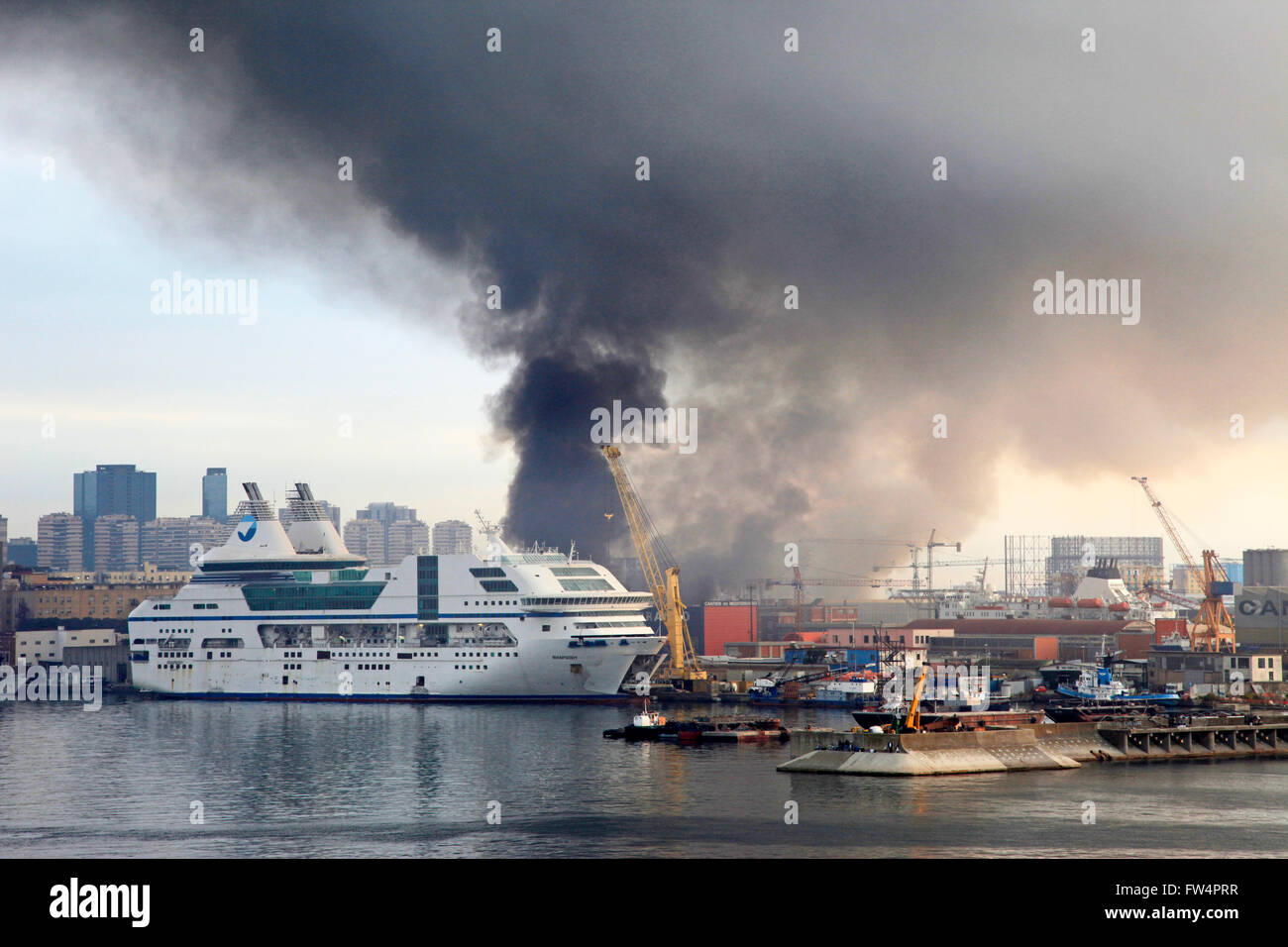 Thick black smoke rises from a fire in a Roma Gypsy camp in Naples ...