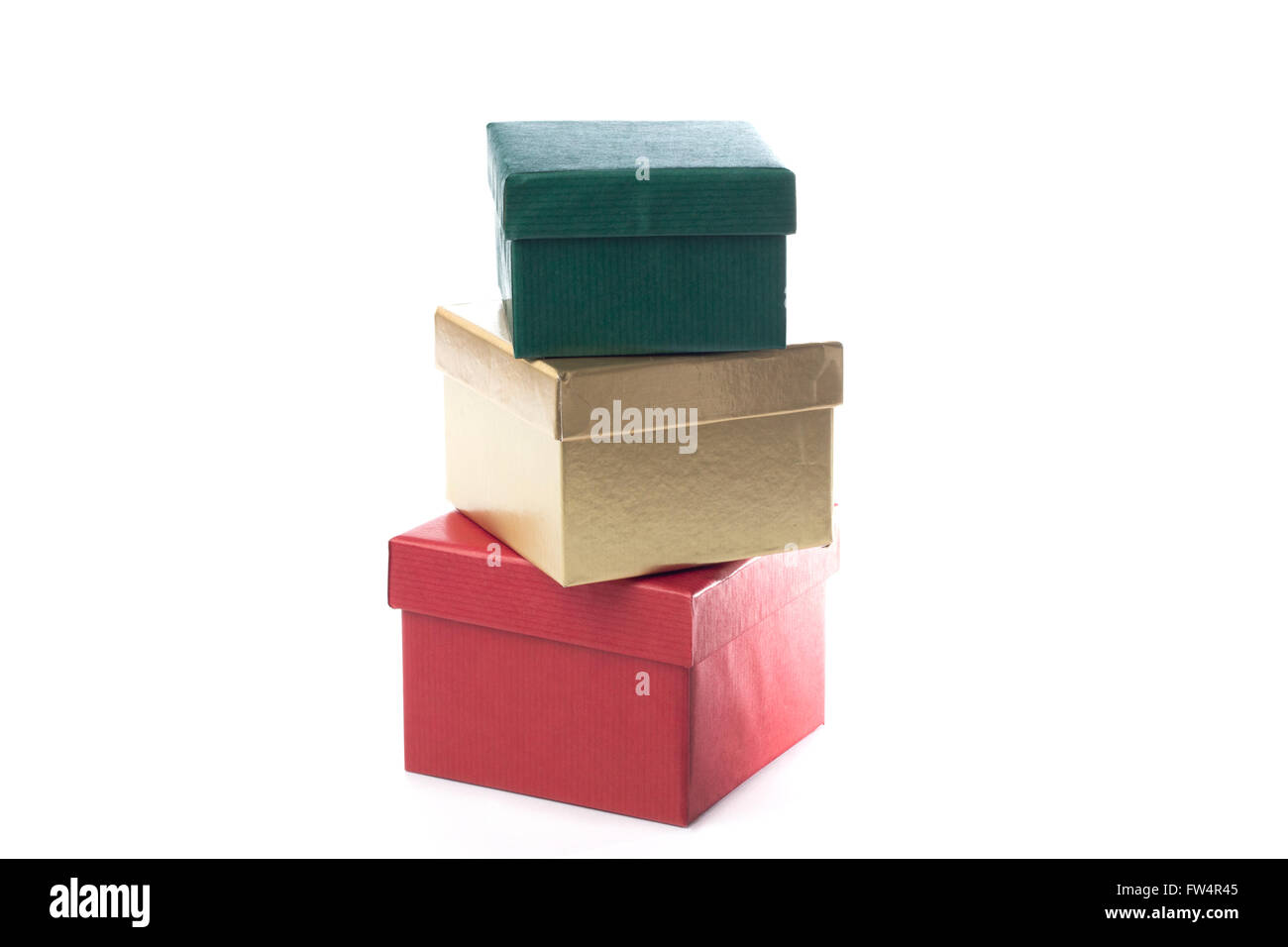Green, gold and red giftboxes, isolated on white background Stock Photo ...