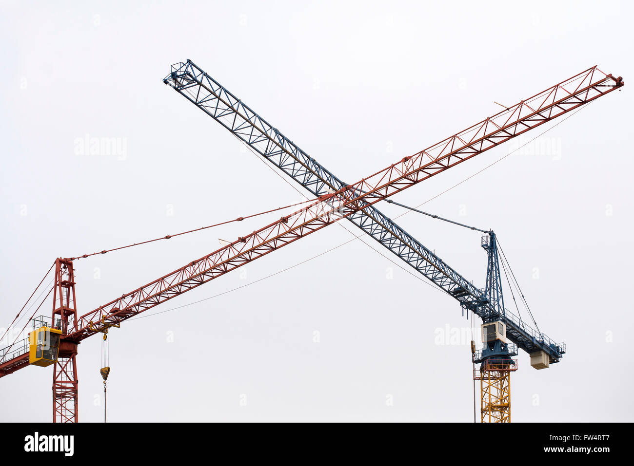 Industrial construction cranes Stock Photo - Alamy