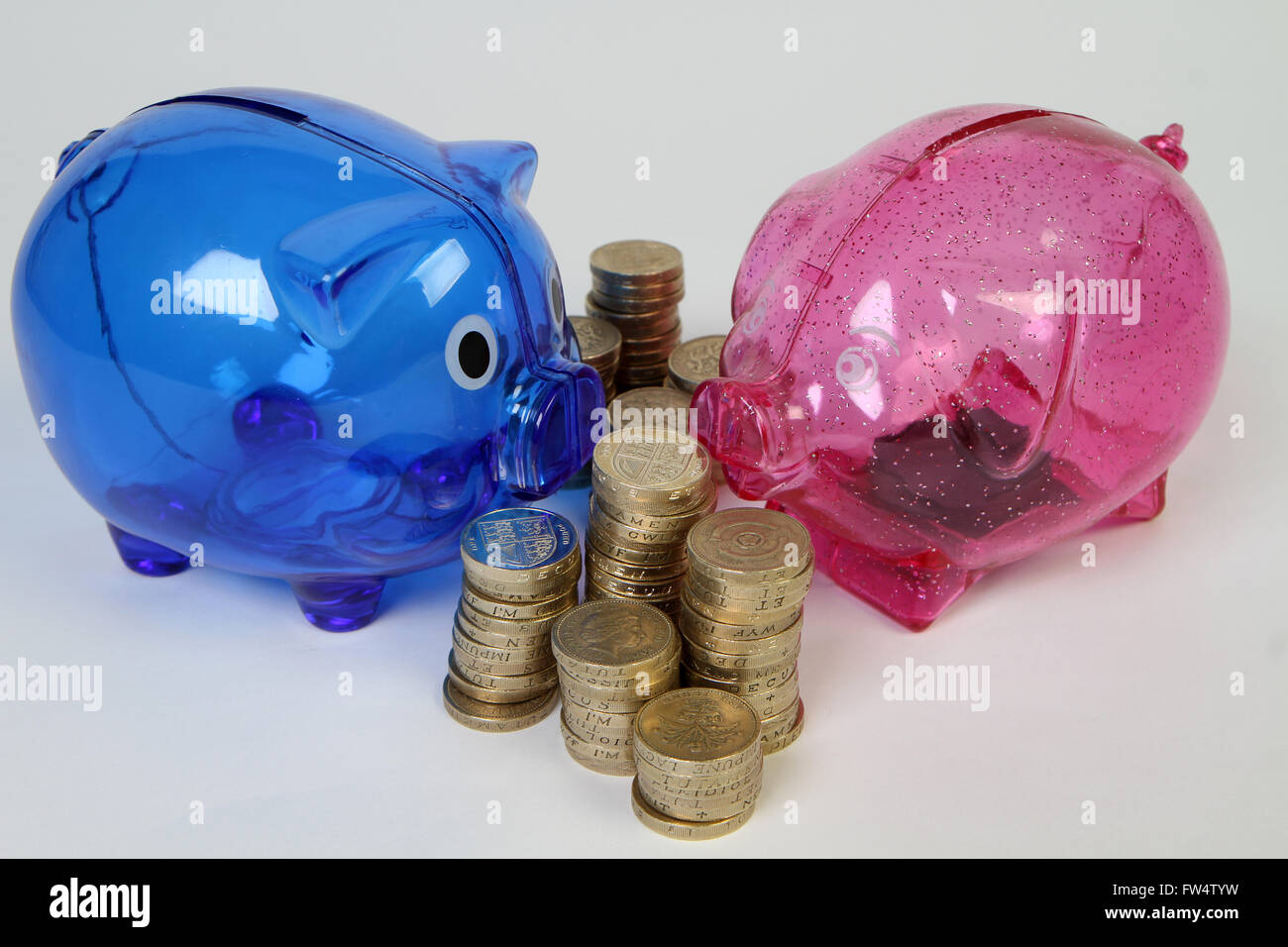 Money being saved in piggy bank Stock Photo - Alamy