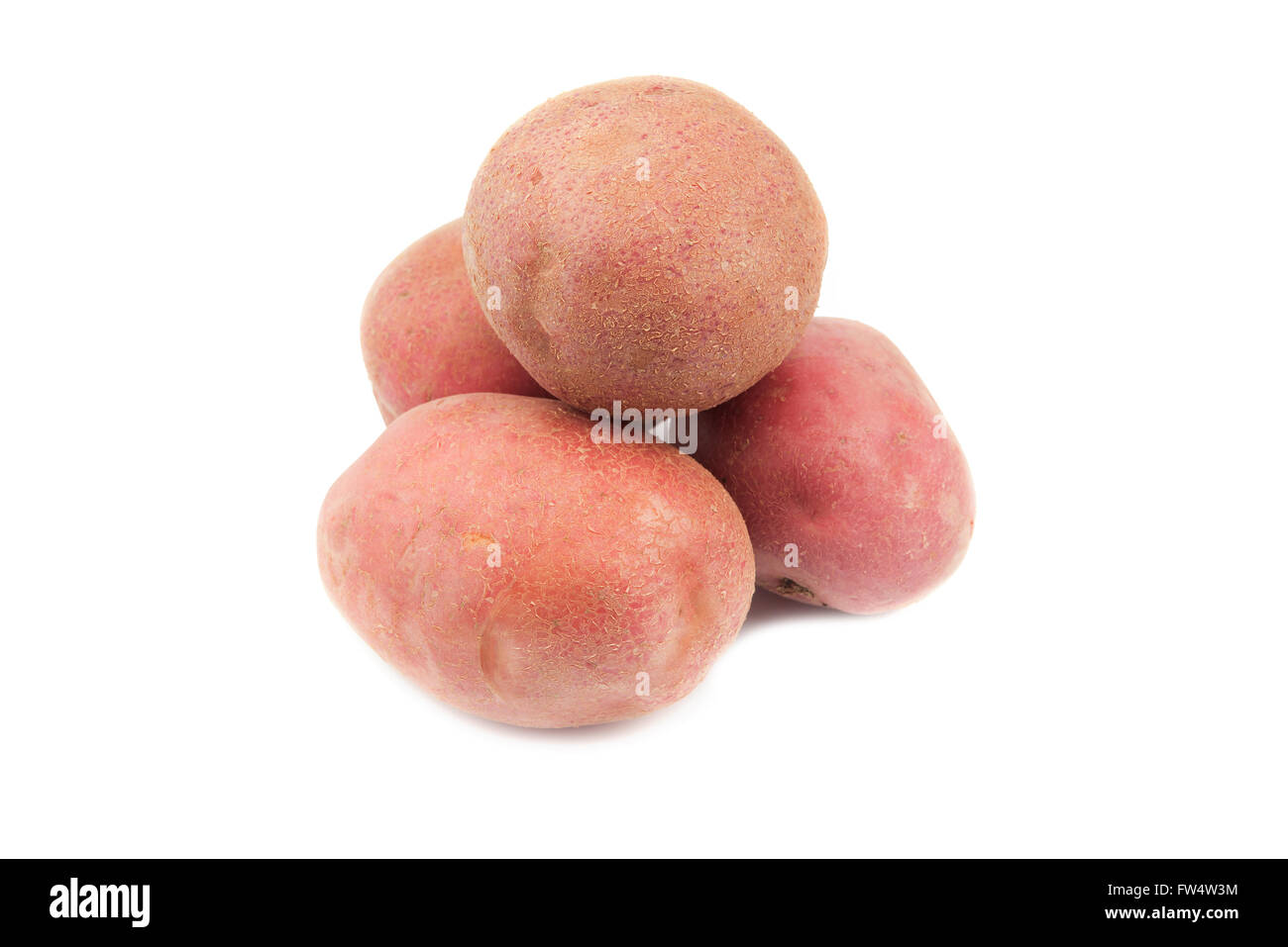 raw red potatoes on white background Stock Photo - Alamy