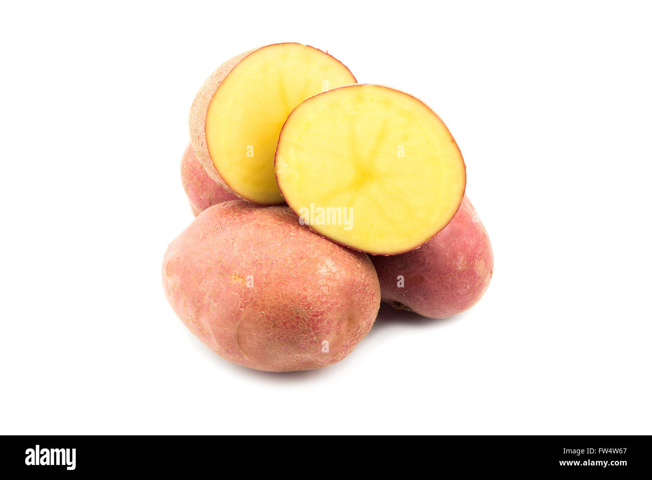 raw red potatoes on white background Stock Photo - Alamy