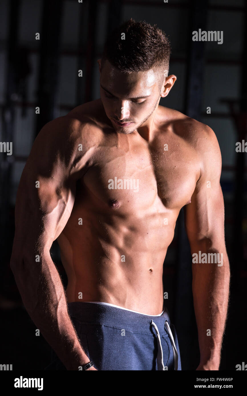 Portrait of young attractive caucasian muscular bodybuilder man with ...