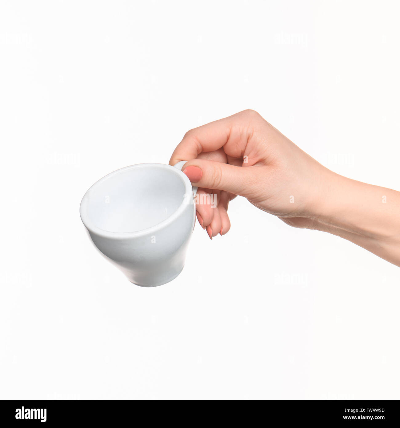 Woman hand with cup on white background Stock Photo - Alamy