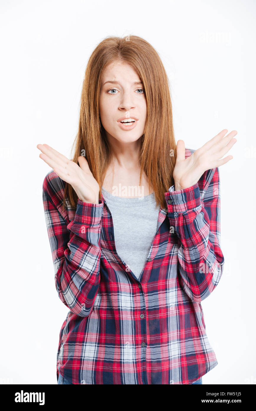 Shocked woman standing isolated on a white background Stock Photo - Alamy