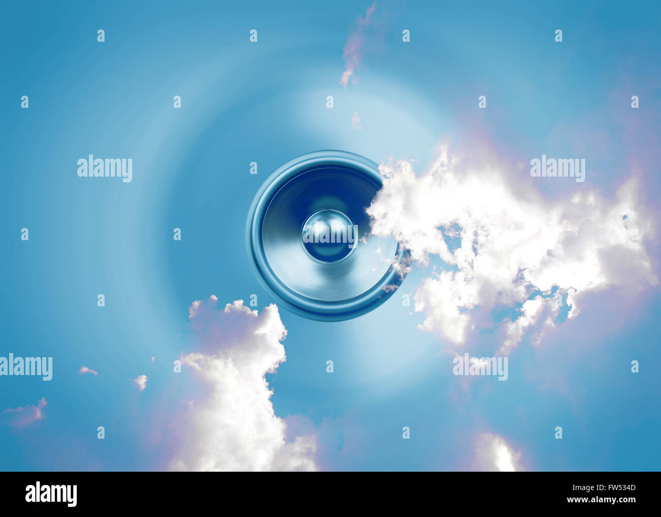 Spinning music speaker in a blue sky with clouds Stock Photo - Alamy