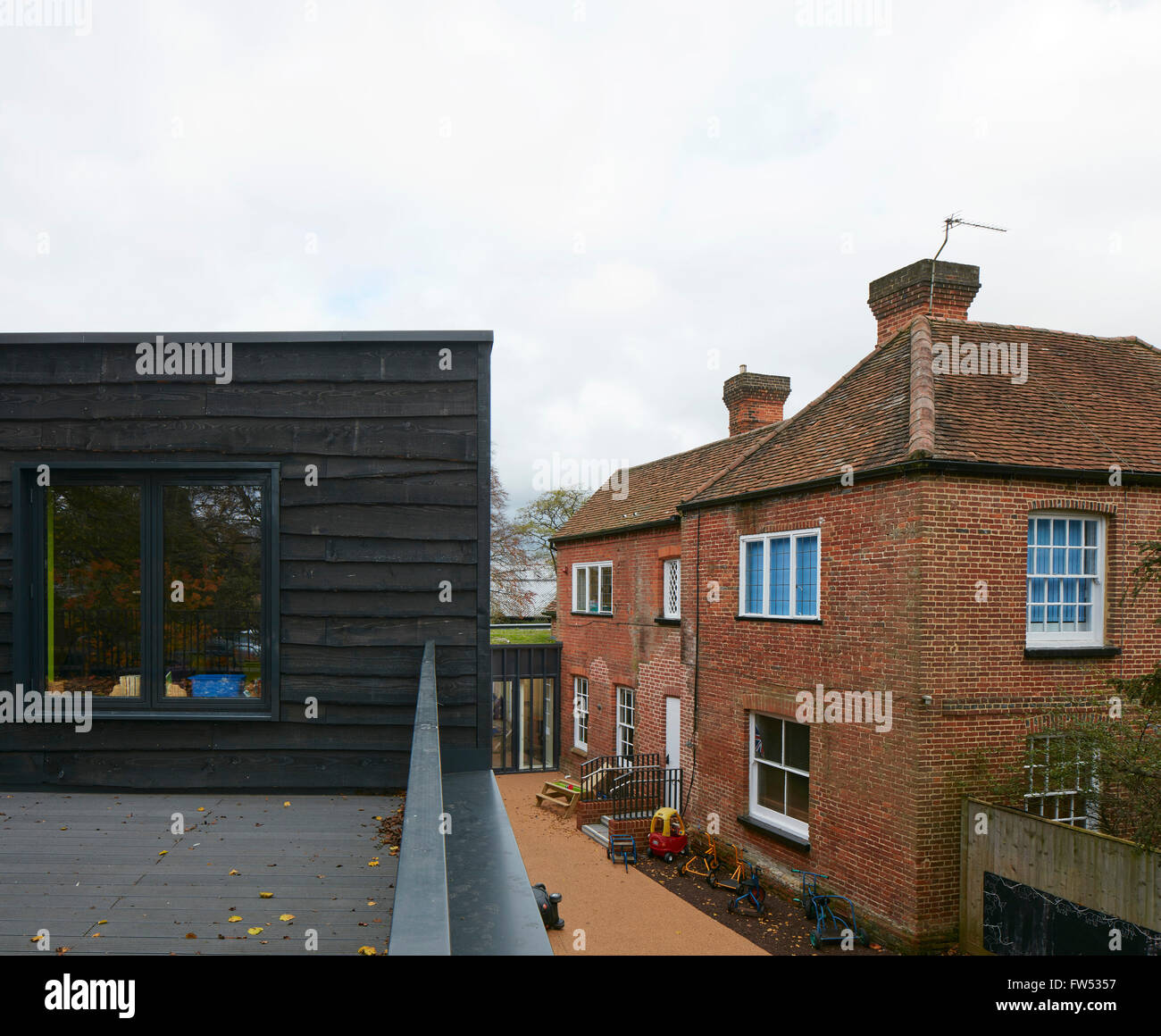 Juxtaposition of new extension and existing listed building. Davenies ...