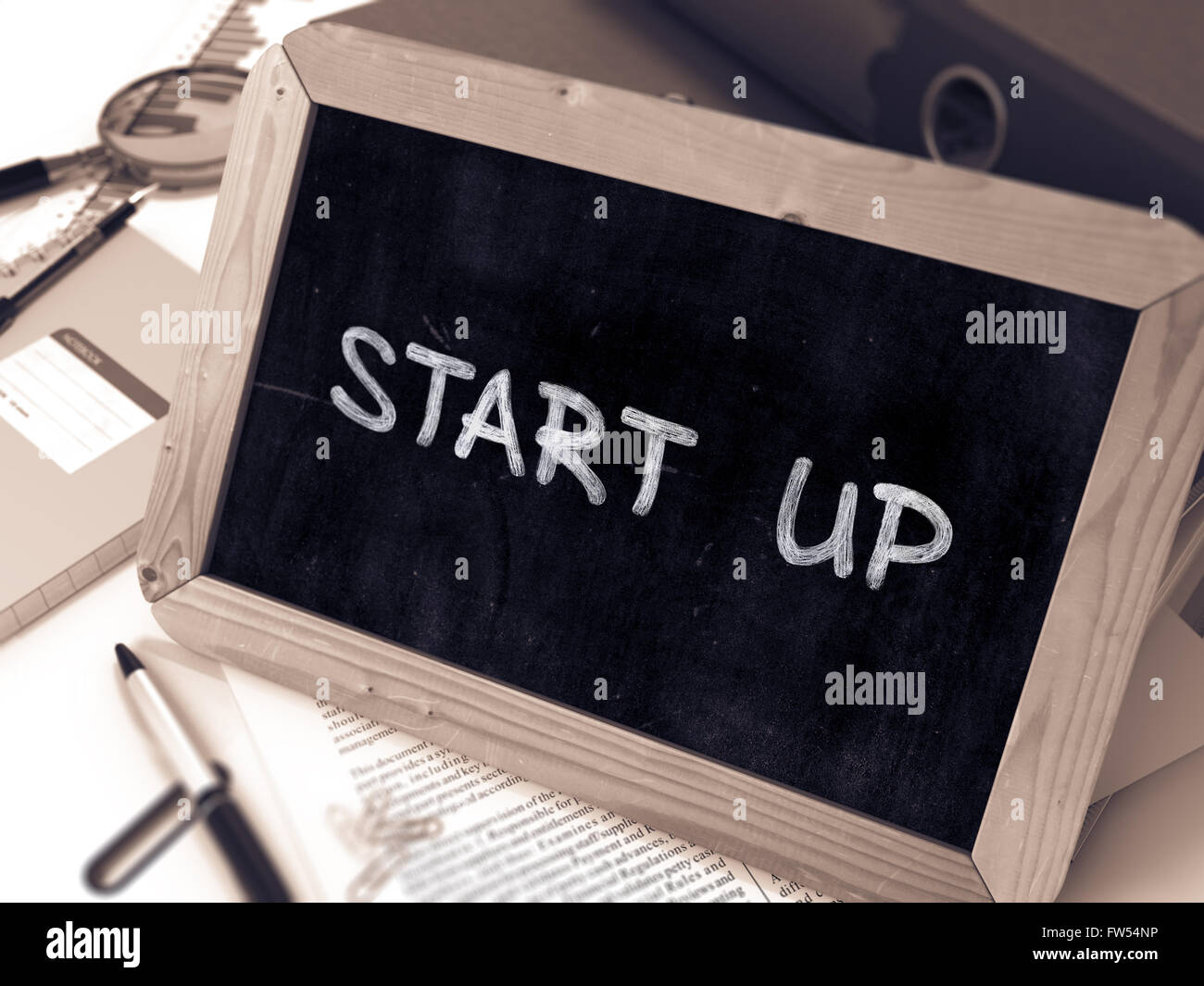 Start Up - Chalkboard with Hand Drawn Text Stock Photo - Alamy