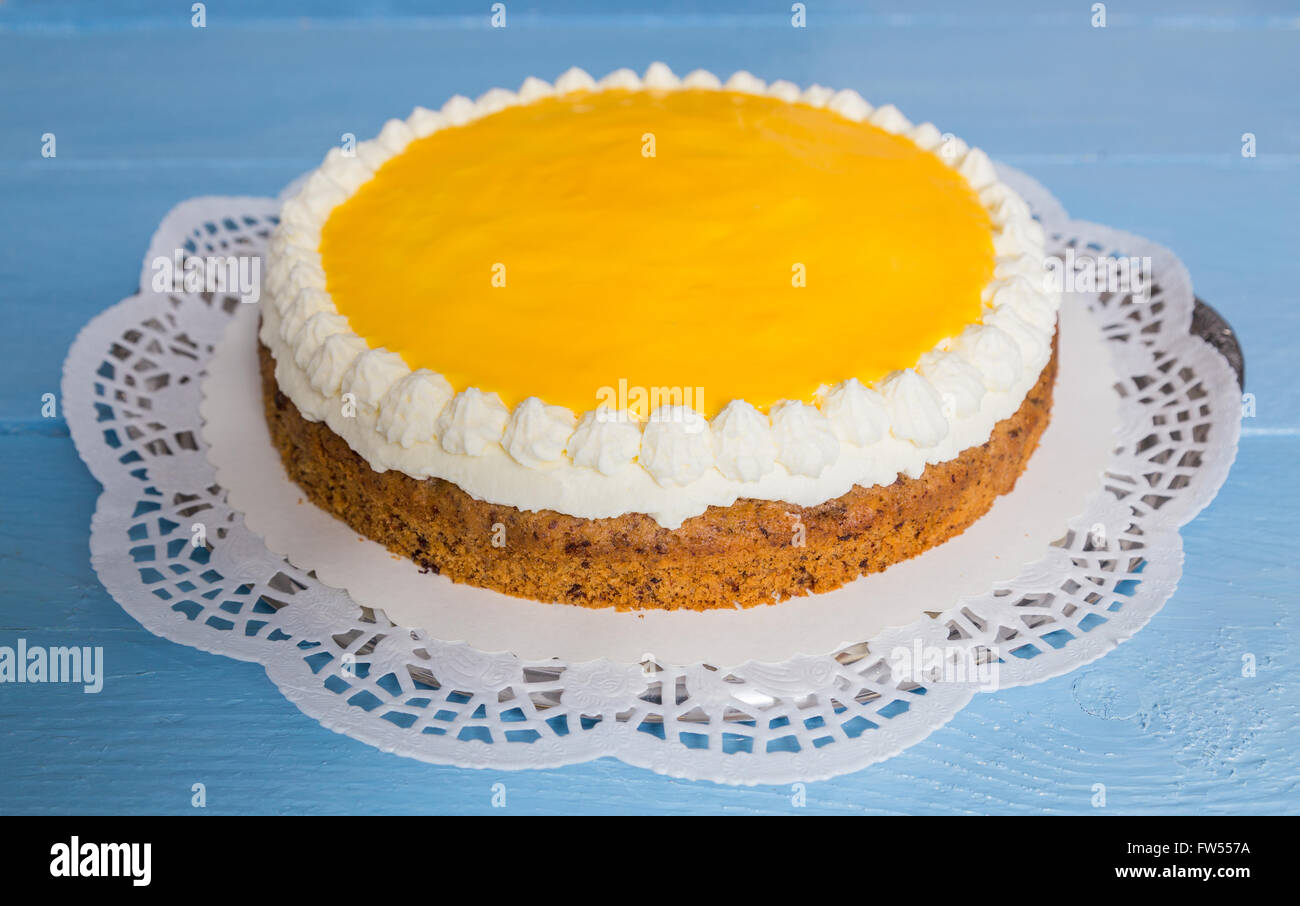 Advocaat cake on blue wood Stock Photo - Alamy
