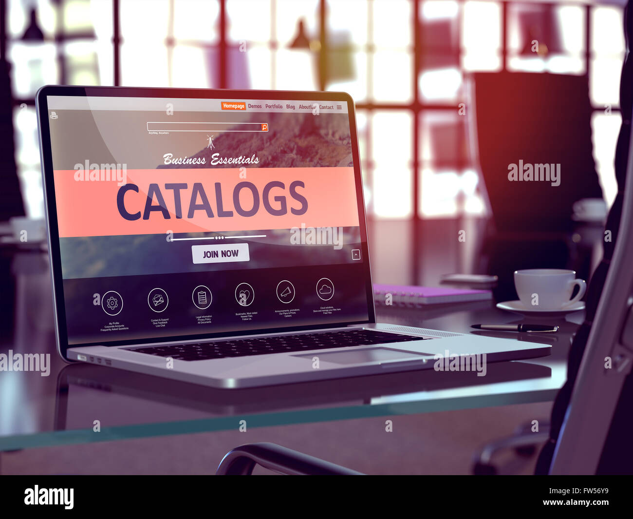 Catalogs on Laptop in Modern Workplace Background Stock Photo - Alamy