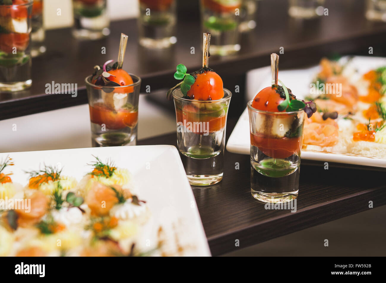 Catering for party. Close up of sandwiches, appetizers and fruit ...