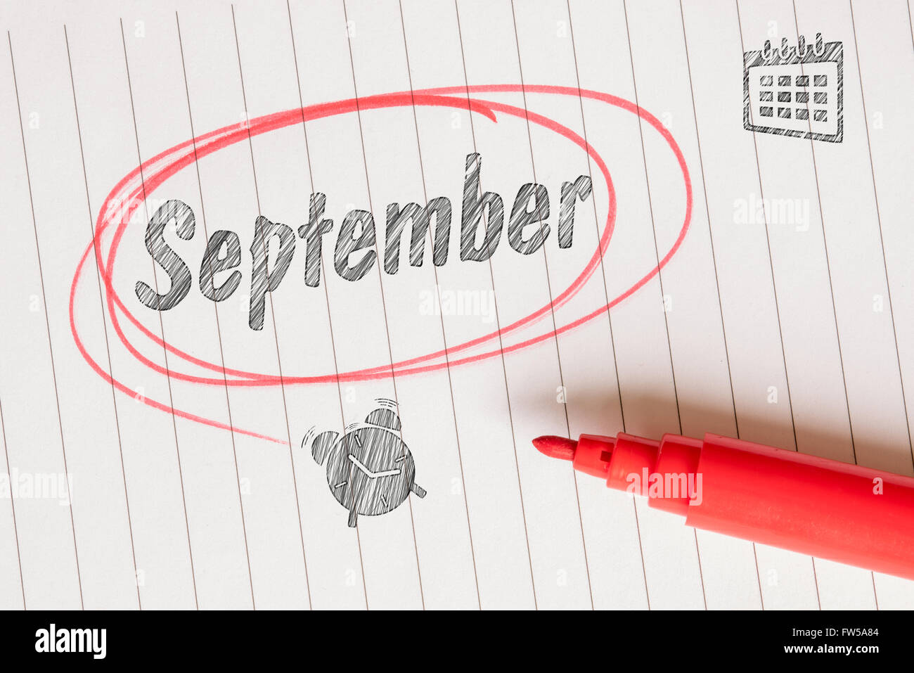 September note with a red brush and a circle Stock Photo - Alamy