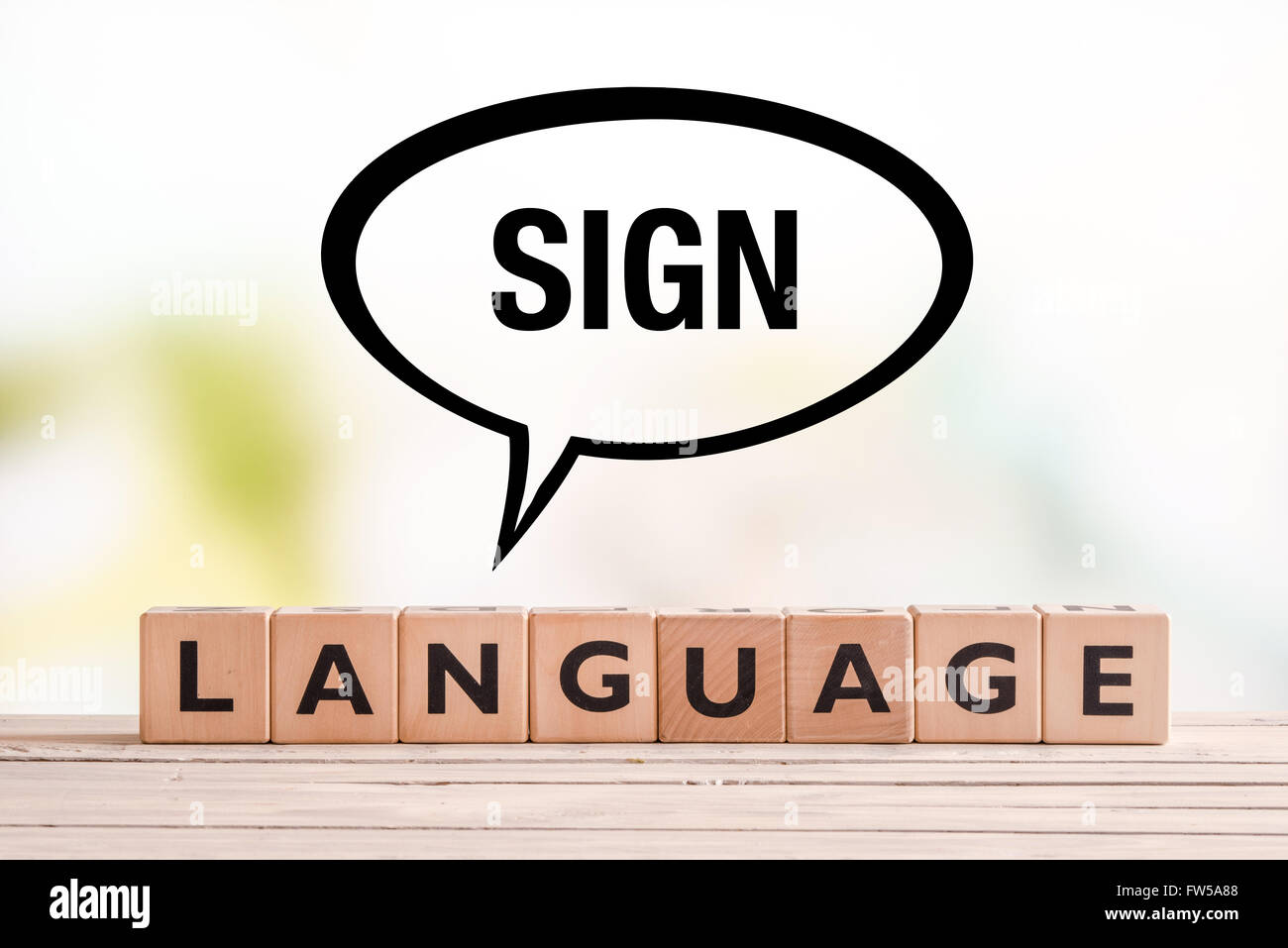 Braille language lesson sign made of cubes on a table Stock Photo - Alamy