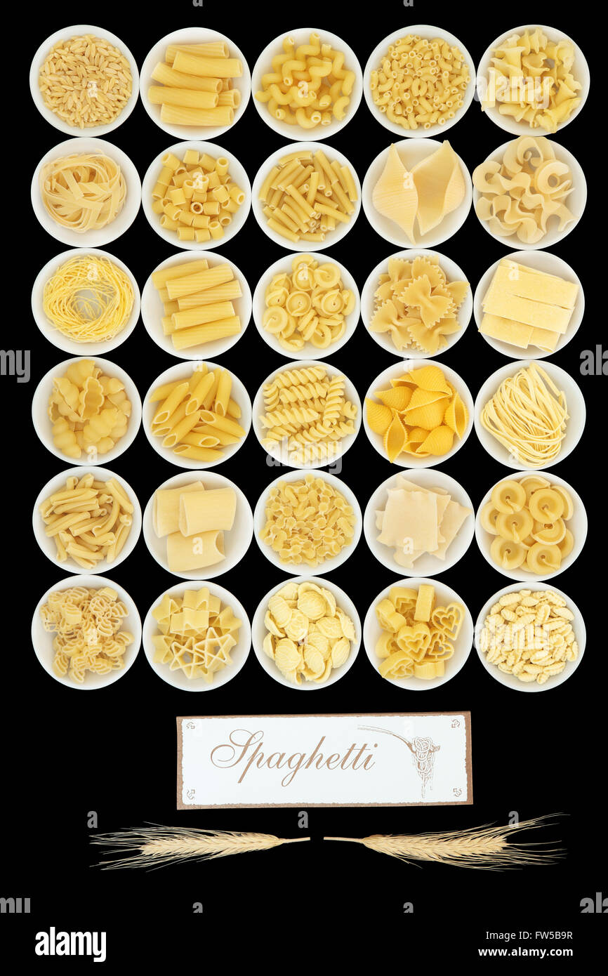 Large pasta collection with spaghetti sign and wheat over black ...