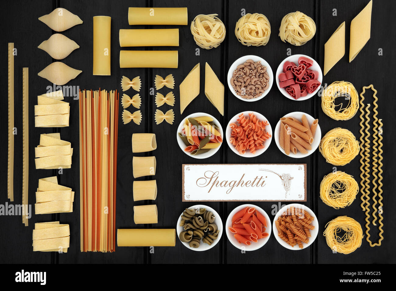 Italian dried food pasta selection with coloured varieties of spinach ...