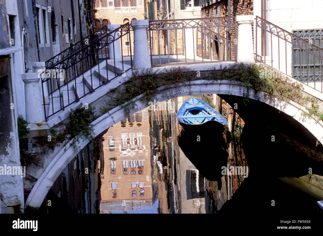 Venice - bridge over canal with a gondola underneath, Venice, Italy ...