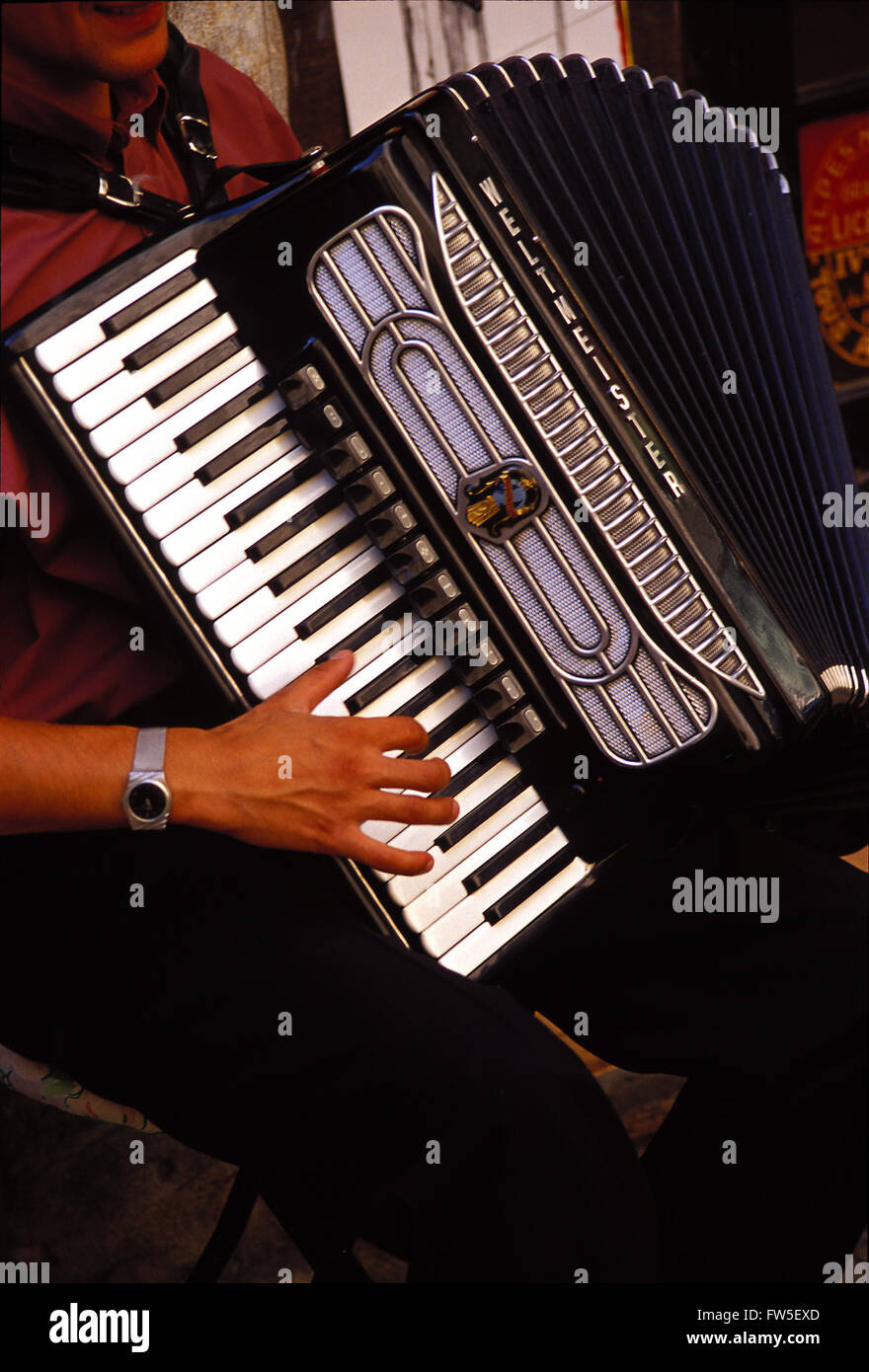 Accordion by Weltmeister, being played Hands on keyboard pictured ...