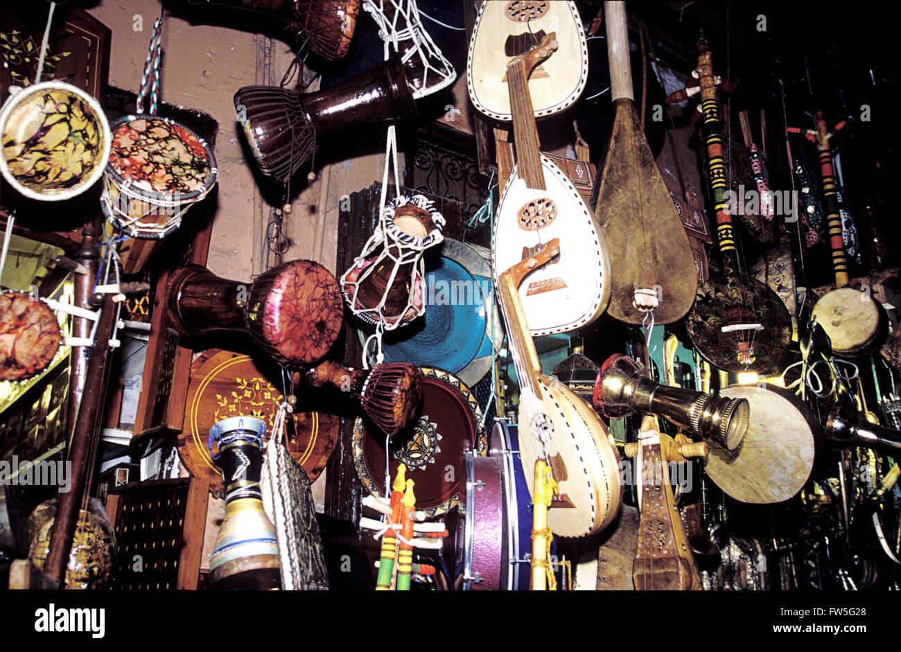 Souk (market) stall of Arab hanging musical instruments in Marrakech ...