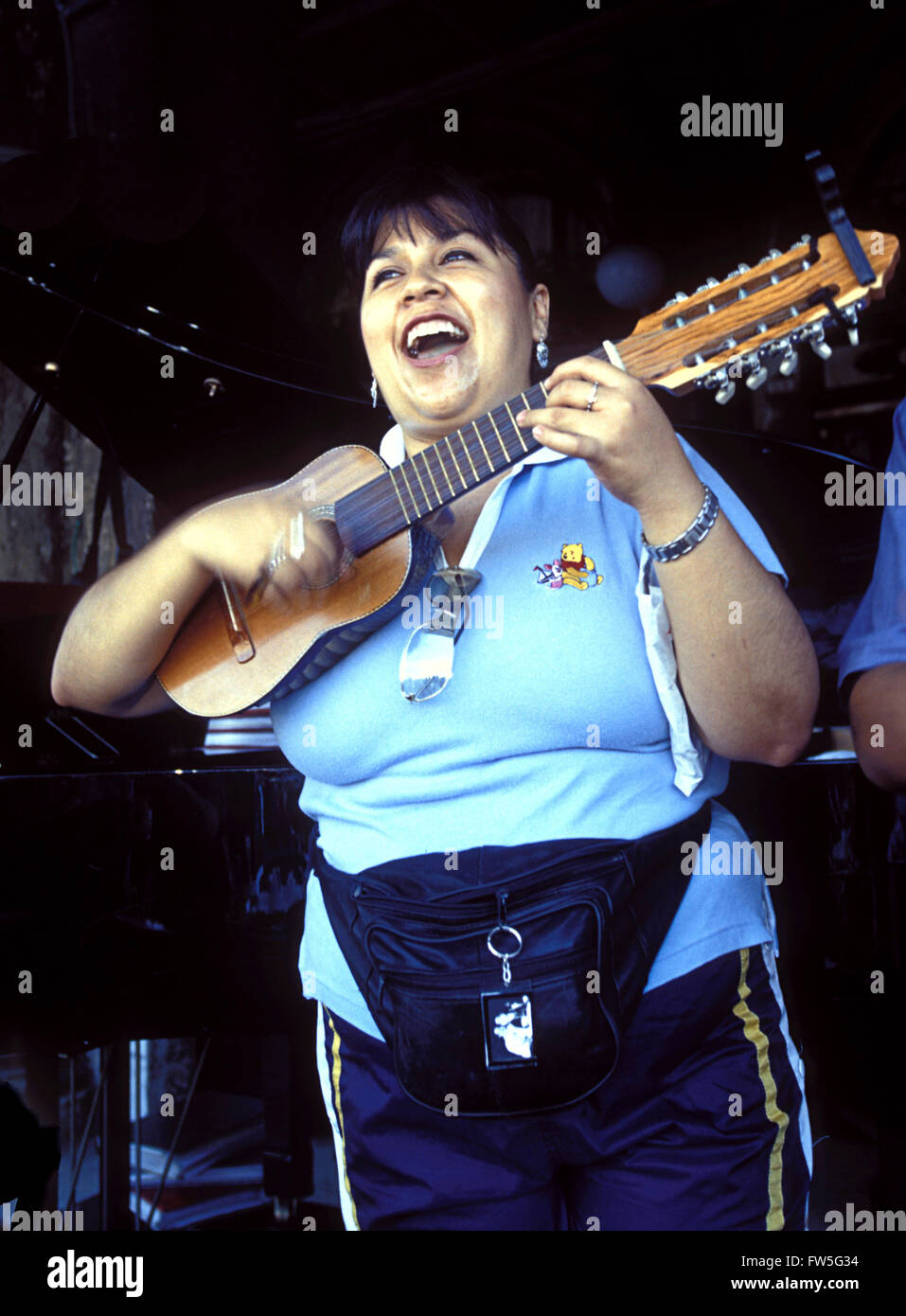 Woman playing mandolin hi-res stock photography and images - Alamy